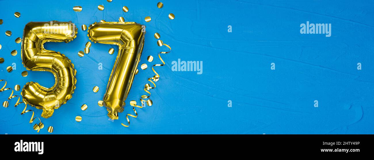 golden foil balloon number fifty seven. Birthday or anniversary card ...