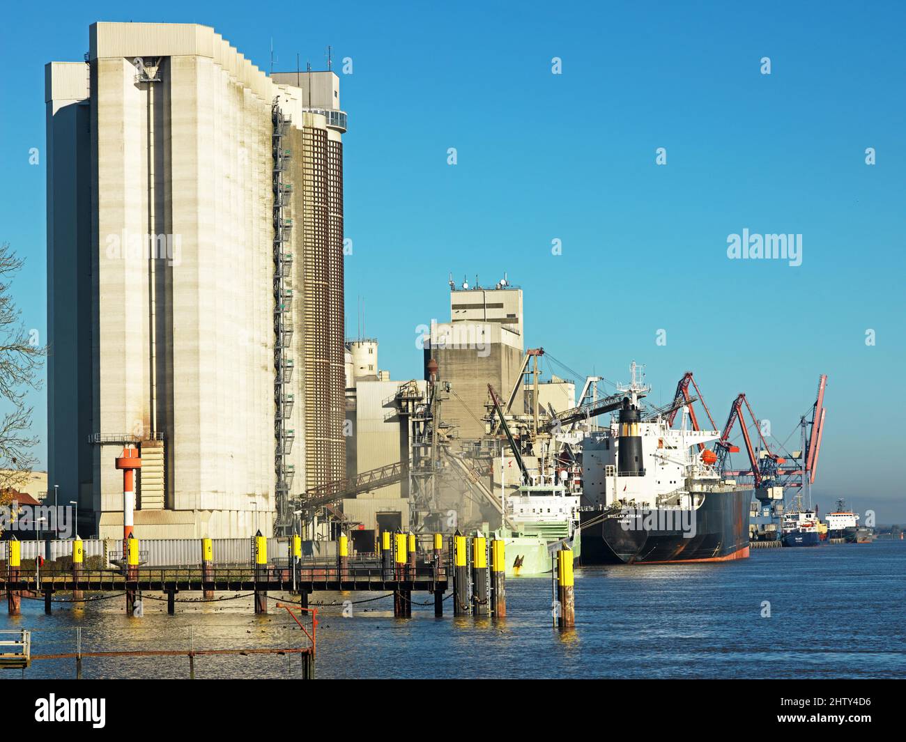 West bank, Lower Weser, unloading pier, grain silos, Brake, Germany ...