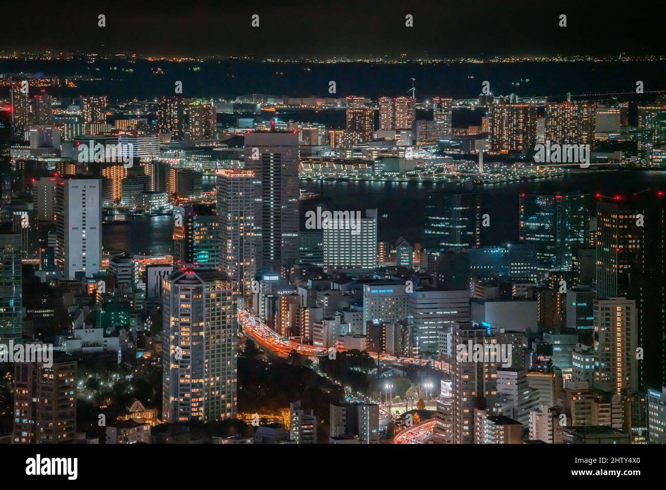 Nightscape of Tokyo with illuminated high-rise modern buildings Stock ...