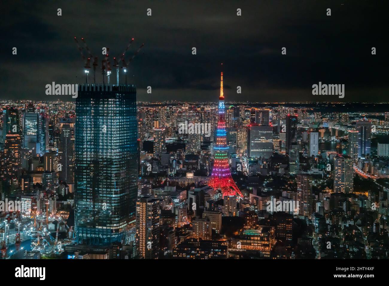 Nightscape of Tokyo with illuminated high-rise modern buildings Stock ...