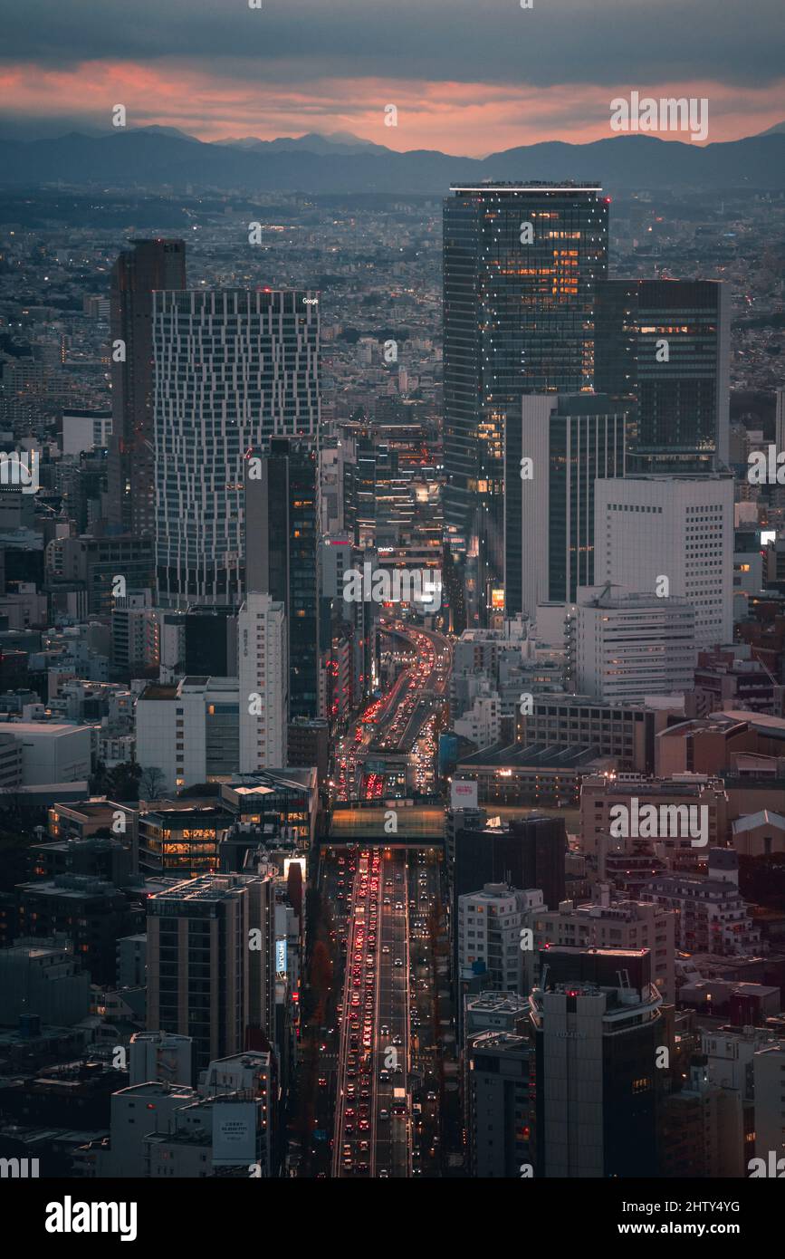 Cityscape of Tokyo with illuminated high-rise modern buildings in the ...