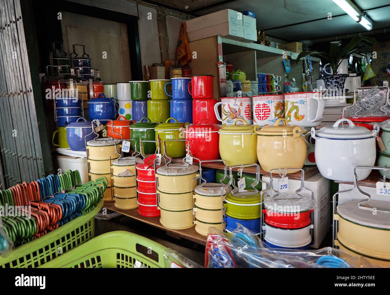 Display shelf of colorful vintage containers Stock Photo - Alamy