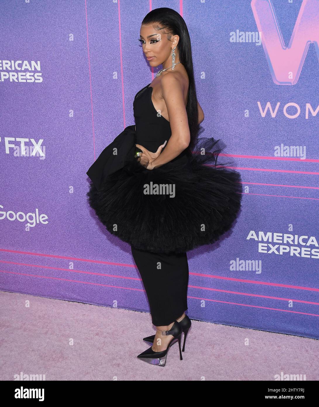 Doja Cat arrives at the 2022 Billboard Women in Music held at the ...