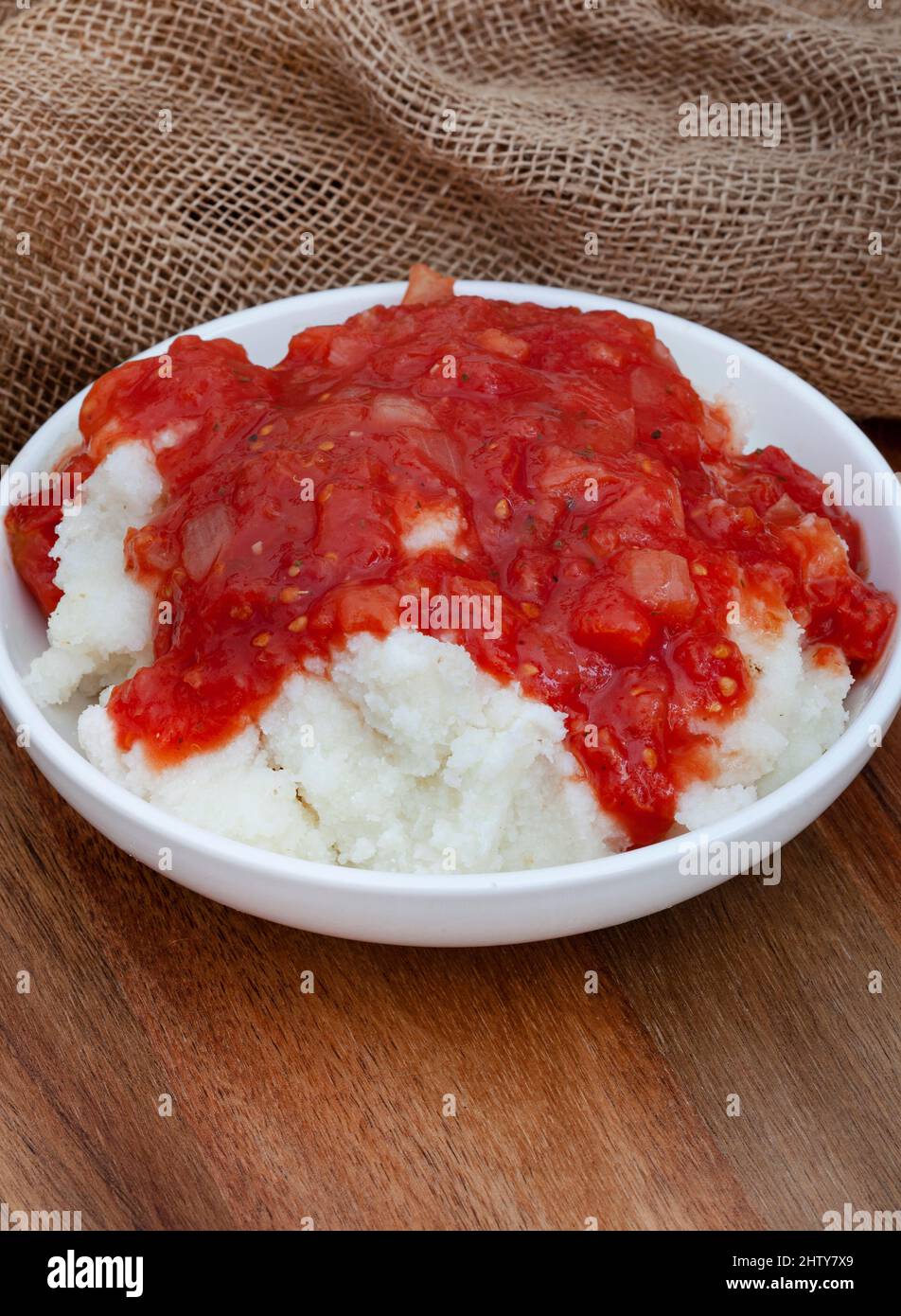 Traditional South African Pap and sous, maize meal covered in tomato ...