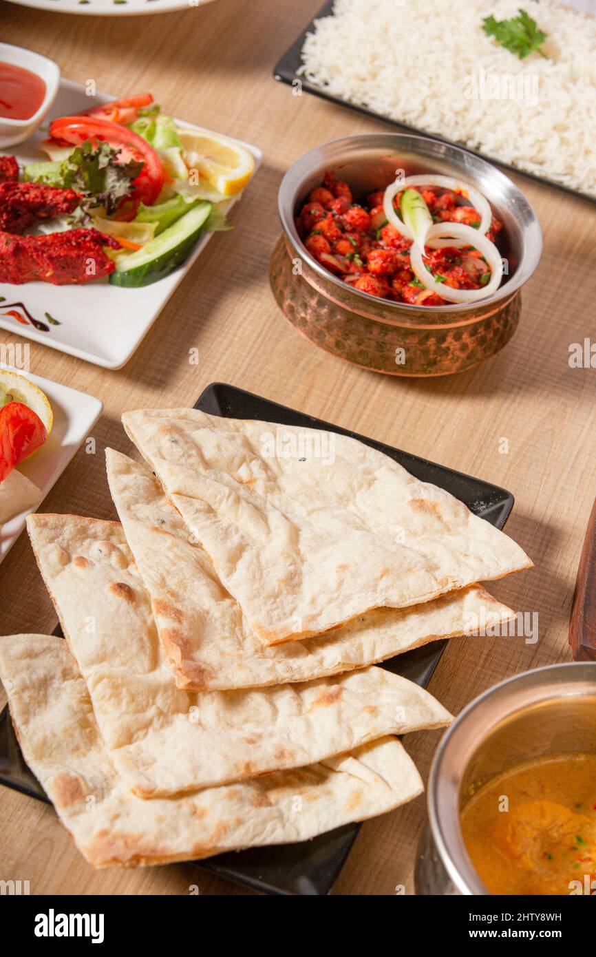 Variety of Indian cuisine dishes Stock Photo - Alamy