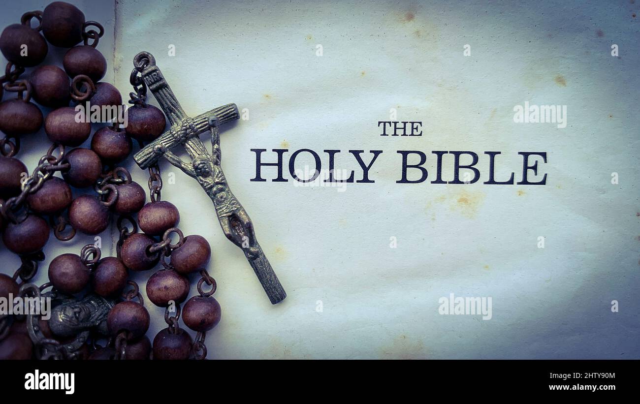 Top view of Holy Bible text with Rosary on old Bible Stock Photo - Alamy