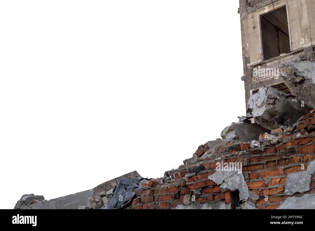 Ruins of a house made of a pile of concrete rubble and bricks isolated ...