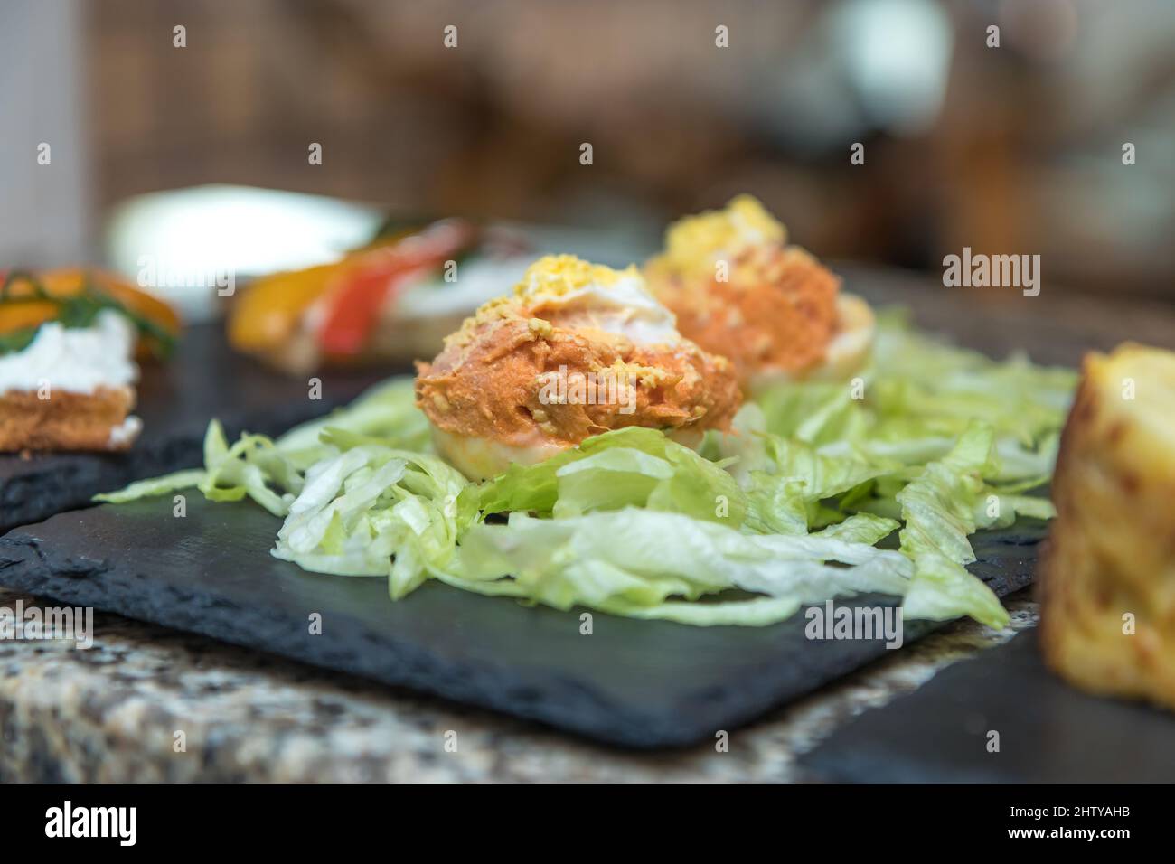 Close up on spanish tapas from a restaurant buffet dinner Stock Photo ...