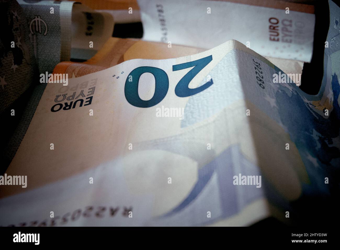 A fragment of a twenty-euro bill in close-up. A 20 euro banknote ...