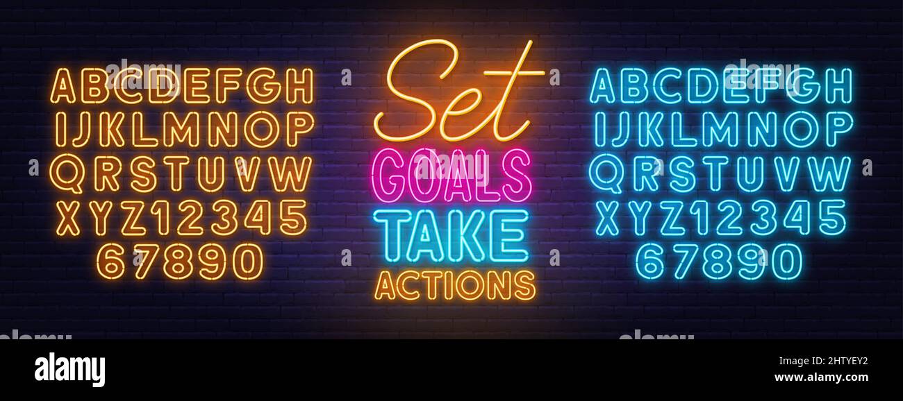 Set Goals Take Actions neon lettering on brick wall background. Yellow ...