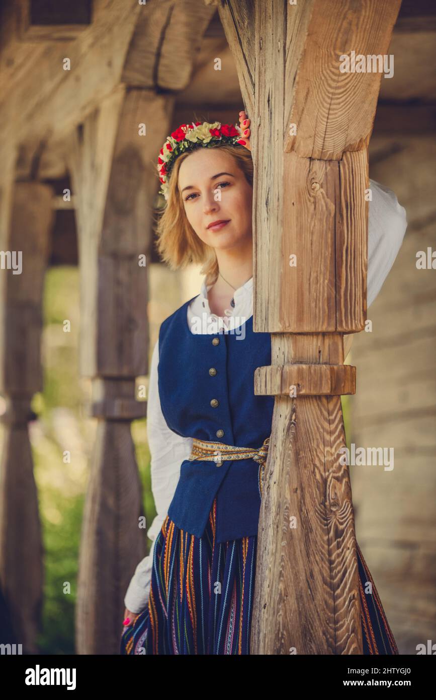 Woman in traditional clothing posing on nature in village Stock Photo ...