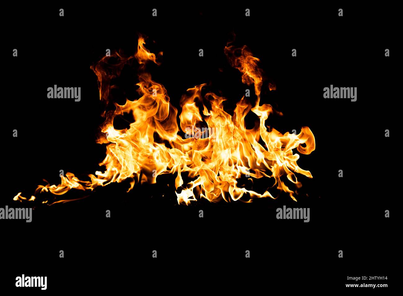 Fire flame. Burn lights on a black background Stock Photo - Alamy