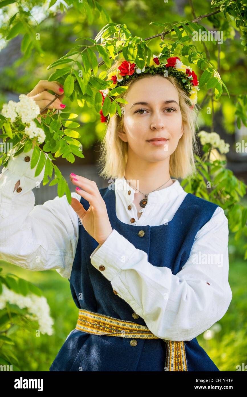 Woman in traditional clothing posing on nature in village Stock Photo ...