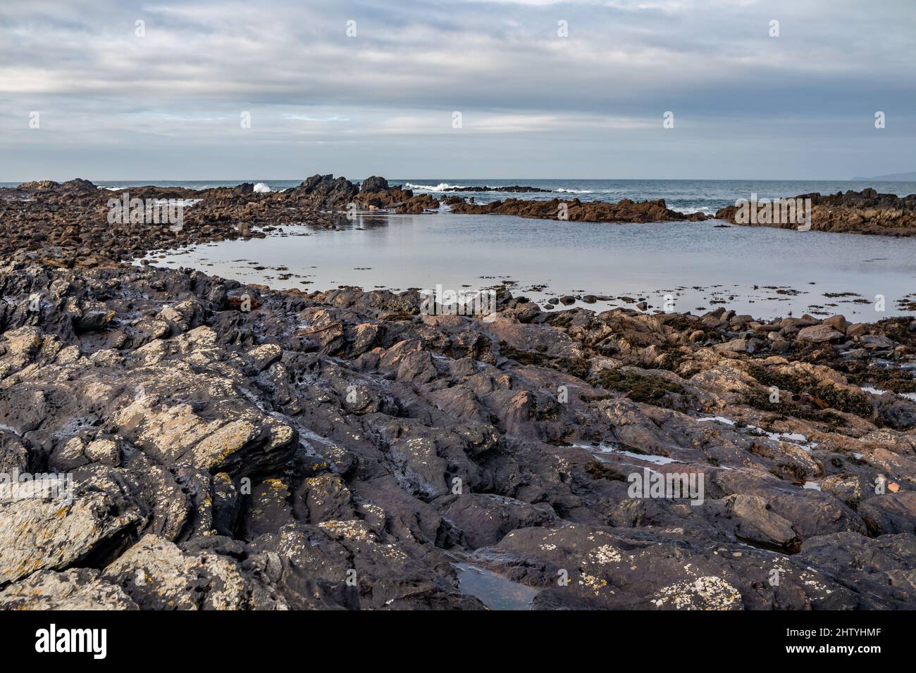 The rocks of Carrickfad by Portnoo at Narin Strand in County Donegal ...