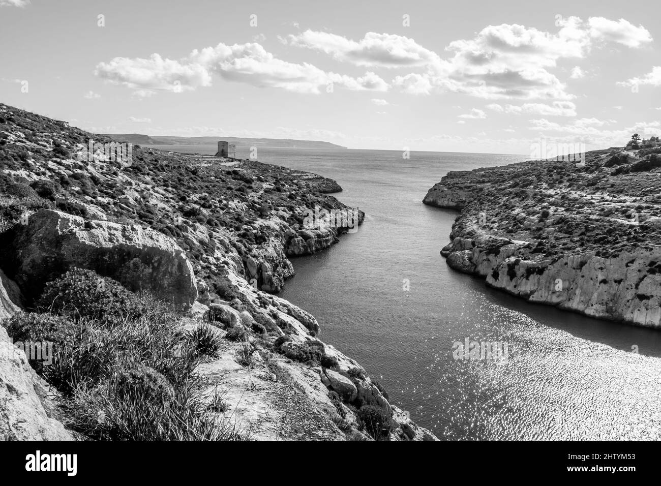 Black and white shot of bay at the drowned ria valley of Mgarr ix-Xini ...