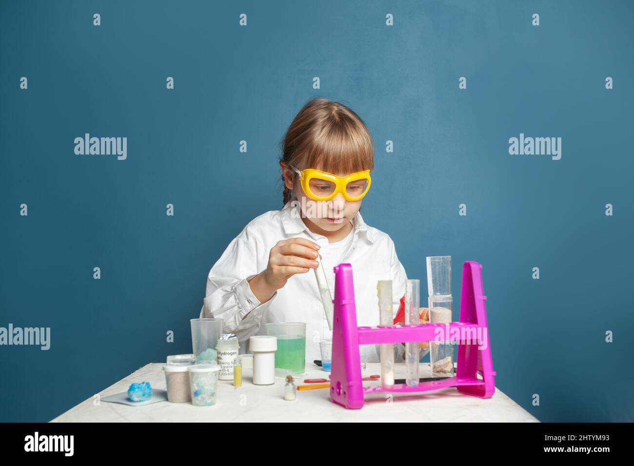 Student kid girl doing biochemistry research at the lab in science ...
