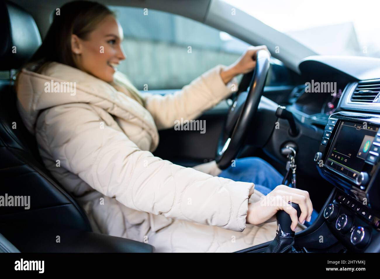 Close up of woman shifting gears on gearbox and driving car Stock Photo ...