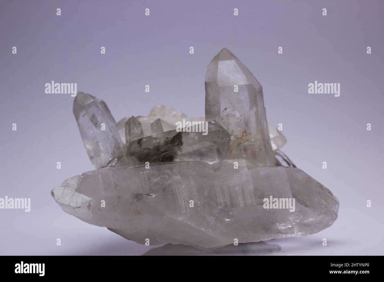 Natural quartz crystal isolated on white background Stock Photo - Alamy