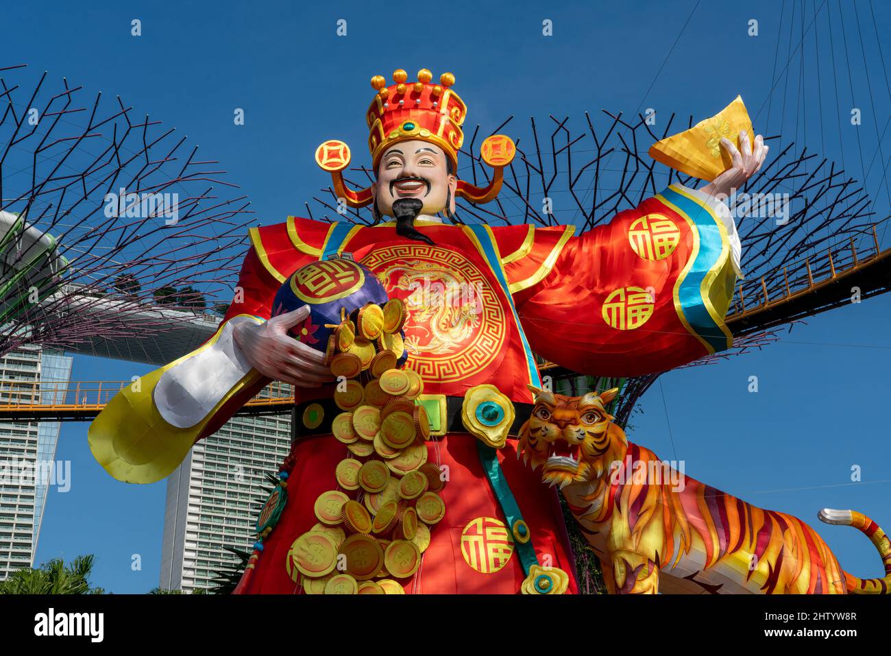 Low angle view of the God of Fortune and tiger figures at the Chinese ...