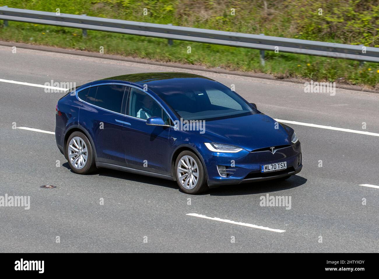 Tesla model 3 uk blue hi-res stock photography and images - Alamy