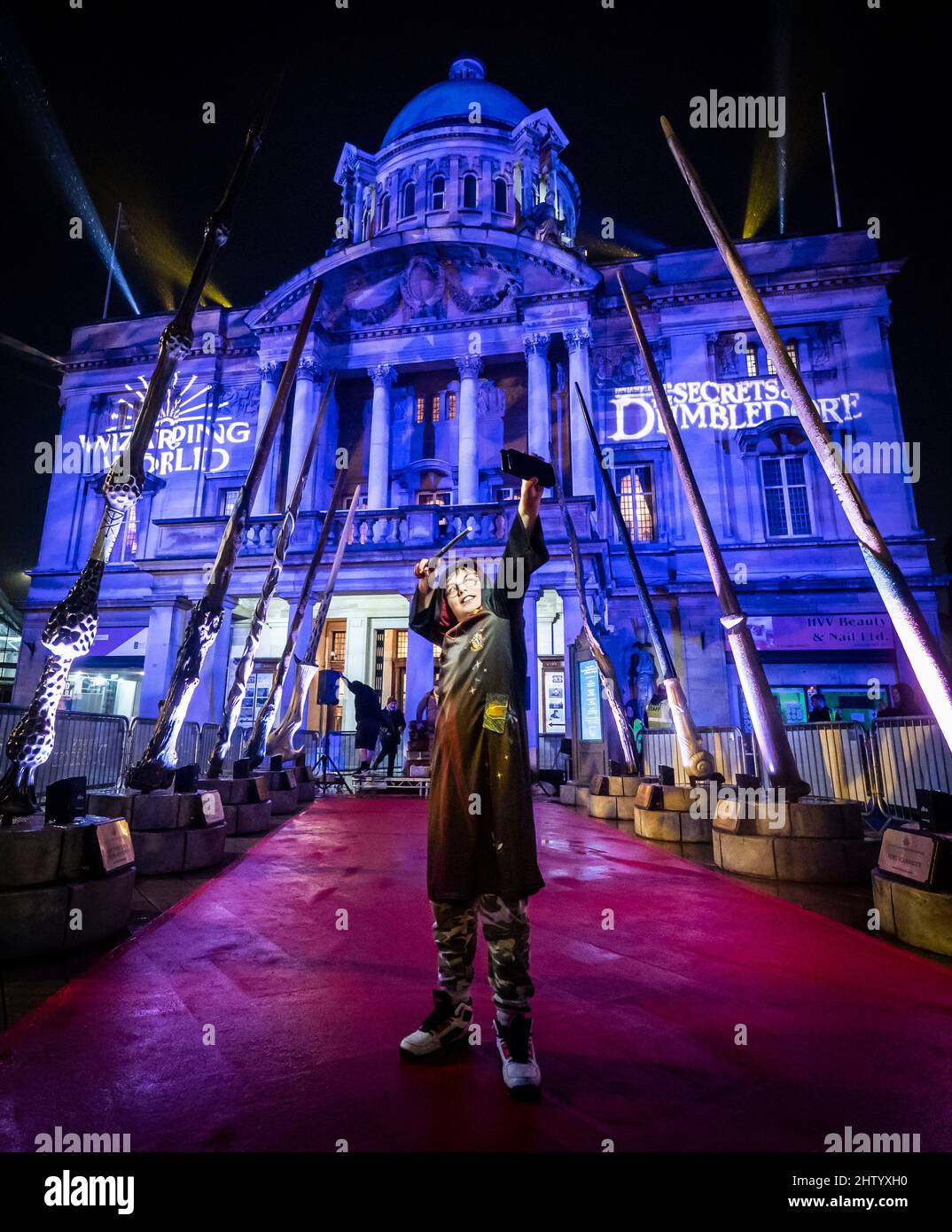 Brandon Inglis, dressed as Harry Potter, takes a selfie, with the ...