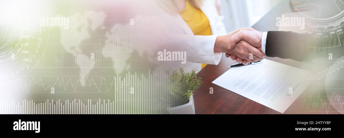 Businesswoman and businessman shaking hands (lorem ipsum text used ...