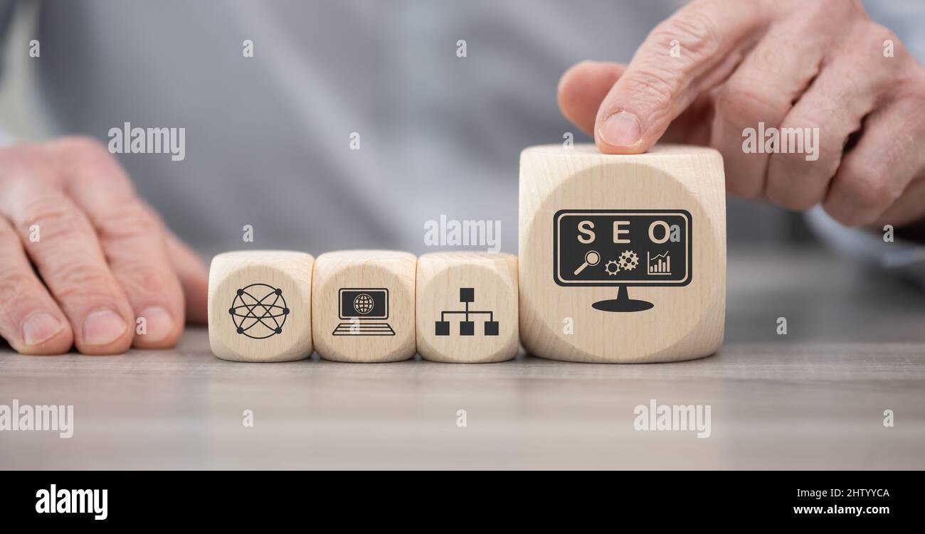 Wooden blocks with symbol of seo concept Stock Photo - Alamy