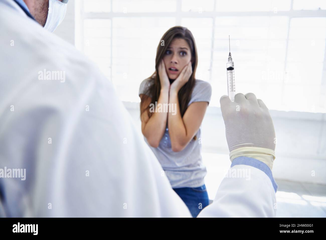 Doctor injection woman hi-res stock photography and images - Alamy