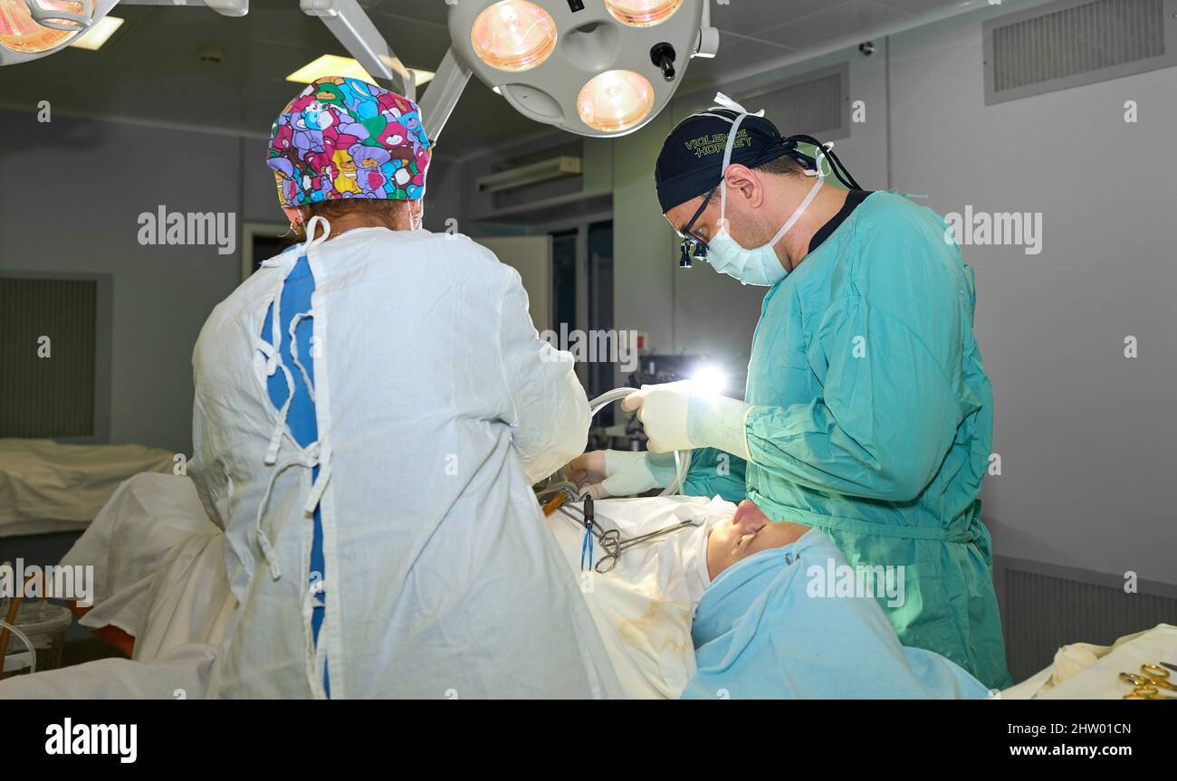 In the hospital operating room. An international team of professional ...