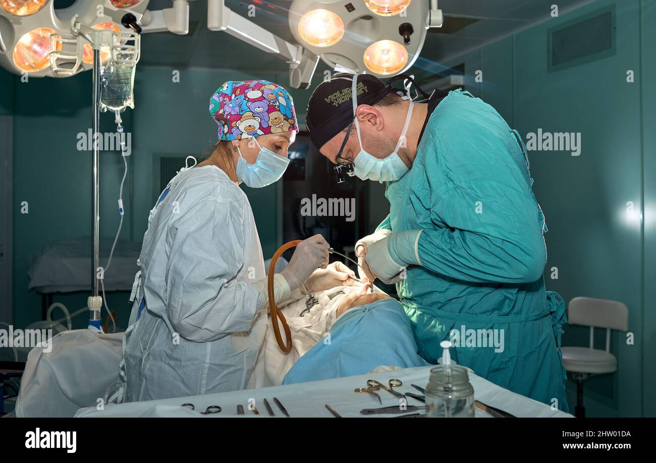 In the hospital operating room. An international team of professional ...