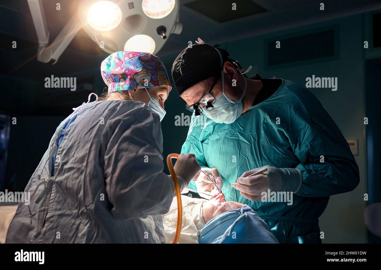 In the hospital operating room. An international team of professional ...
