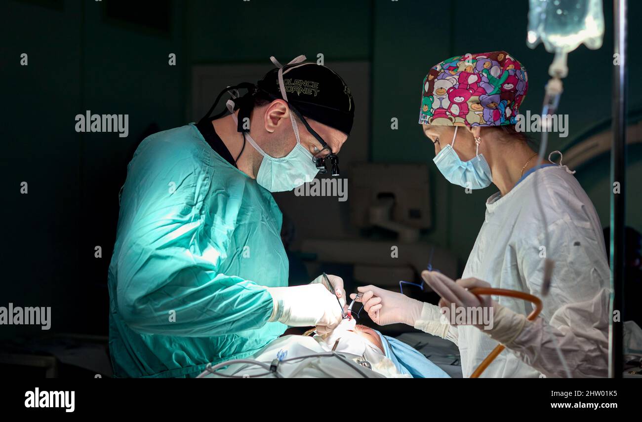 In the hospital operating room. An international team of professional ...