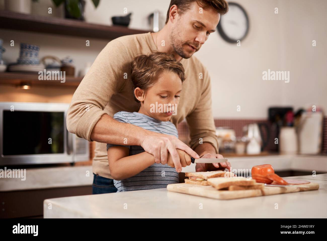 I made my own sandwich today. Shot of a young boy making a sandwich ...