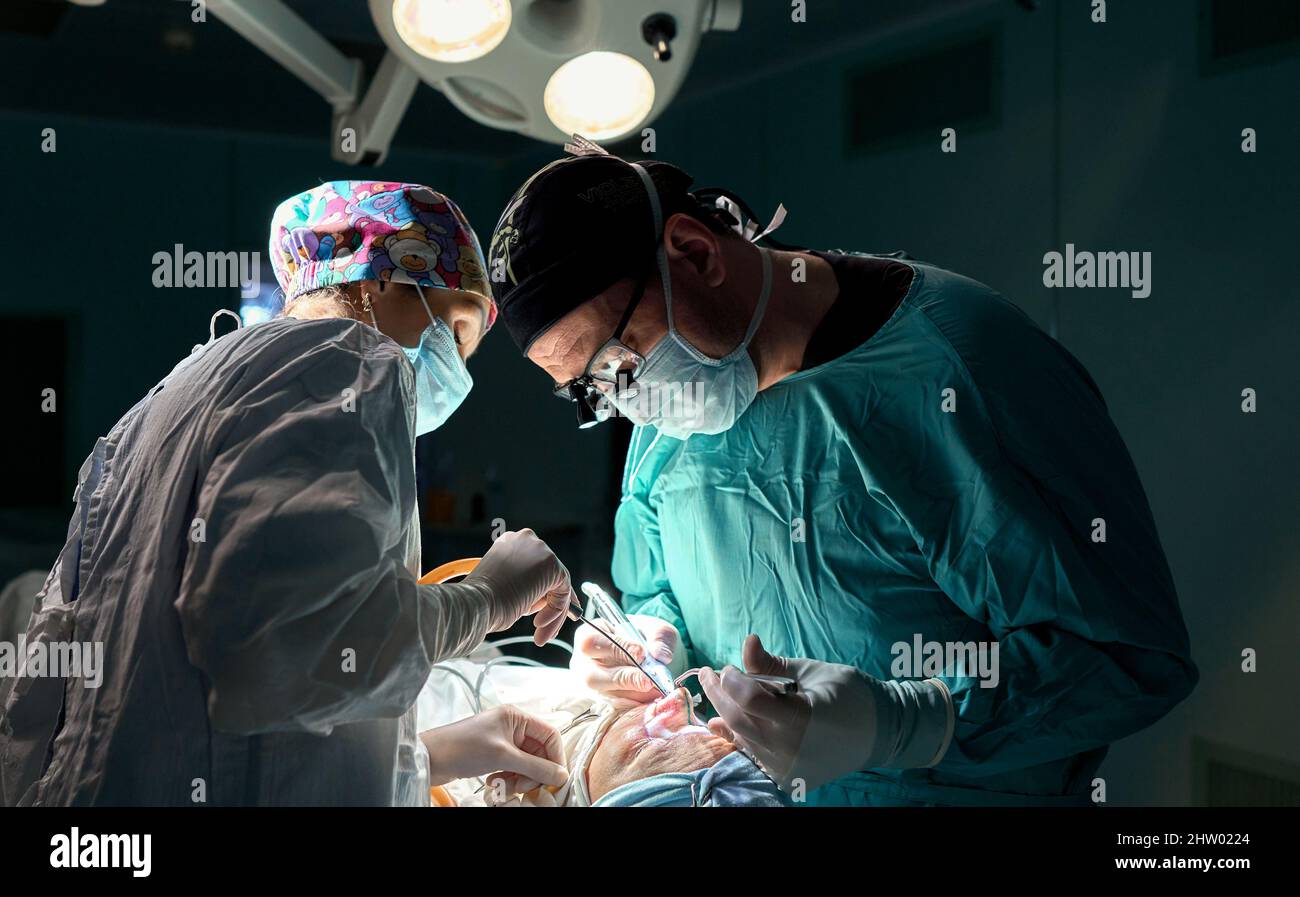 In the hospital operating room. An international team of professional ...
