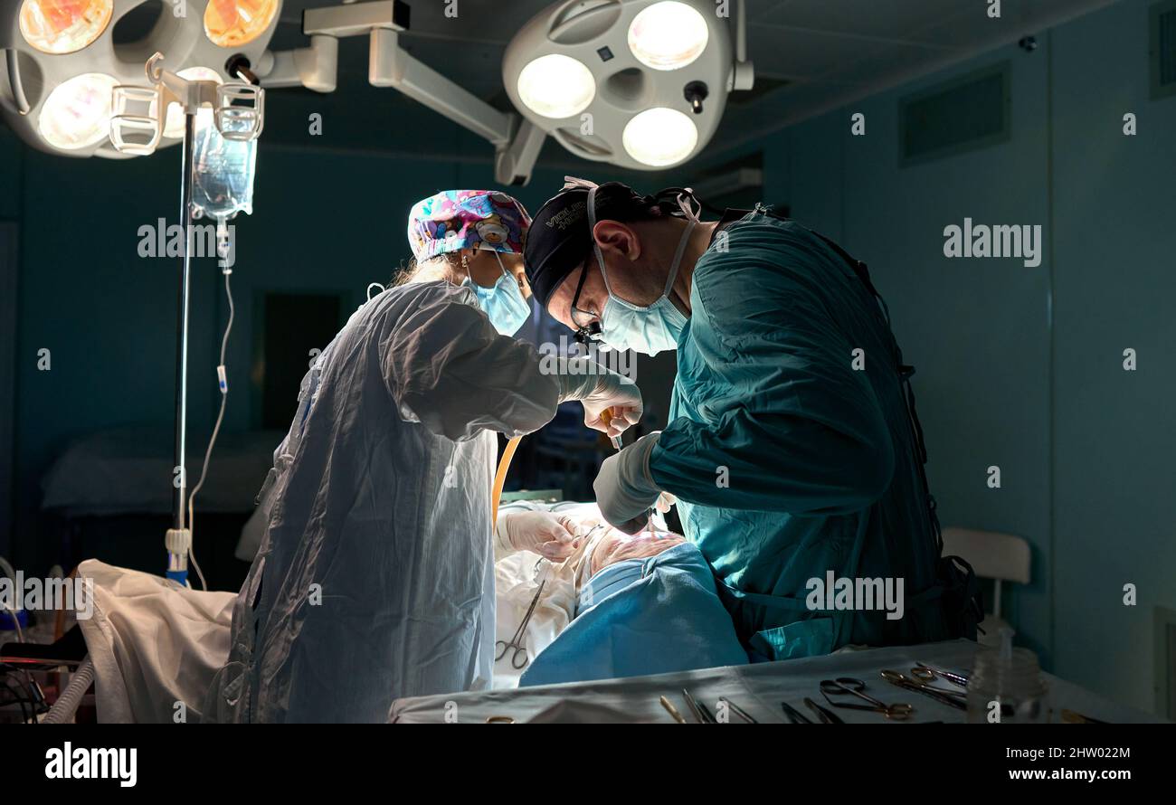 In the hospital operating room. An international team of professional ...