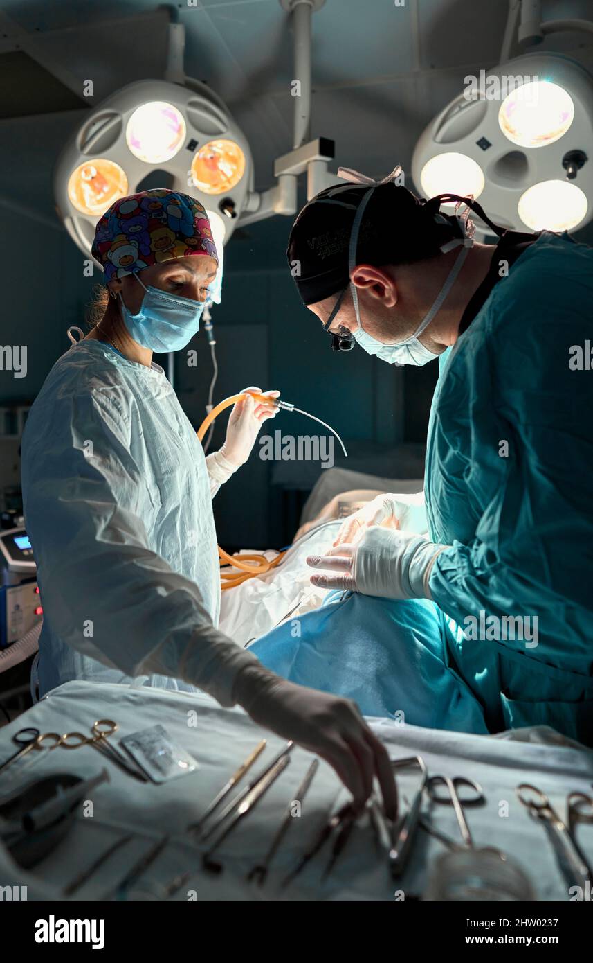 In the hospital operating room. An international team of professional ...