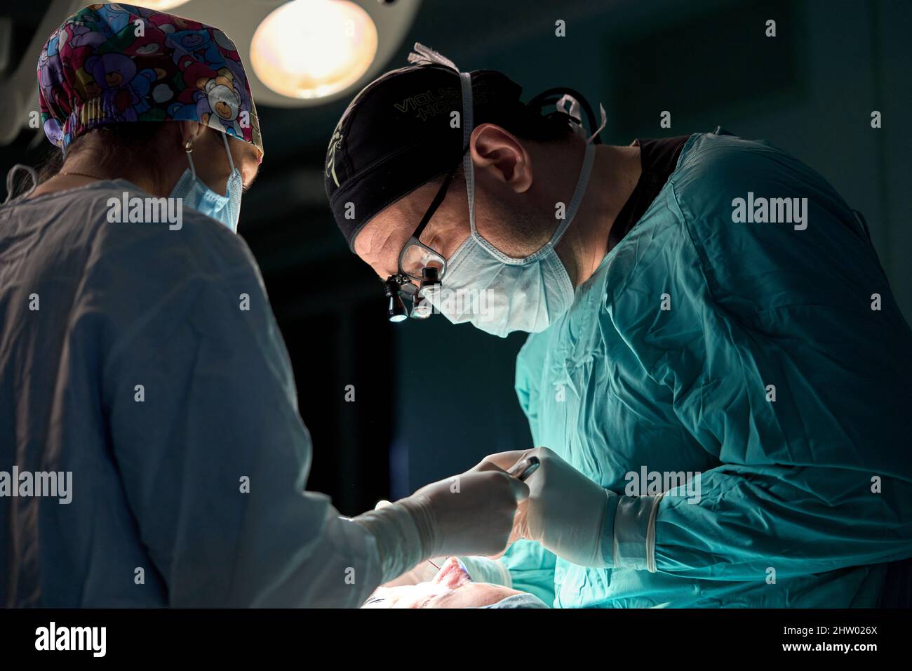 In the hospital operating room. An international team of professional ...