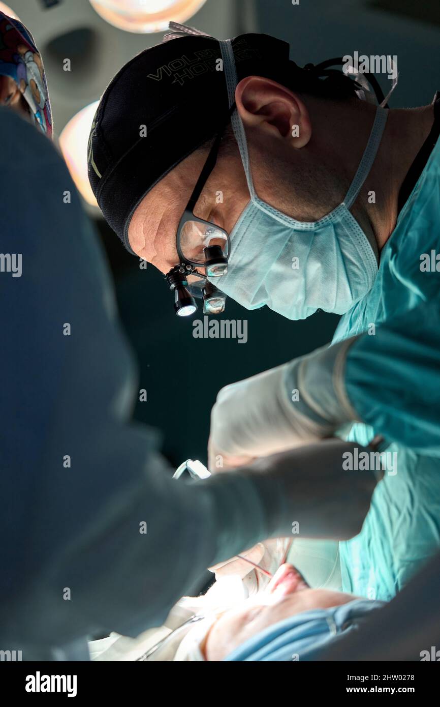 In the hospital operating room. An international team of professional ...