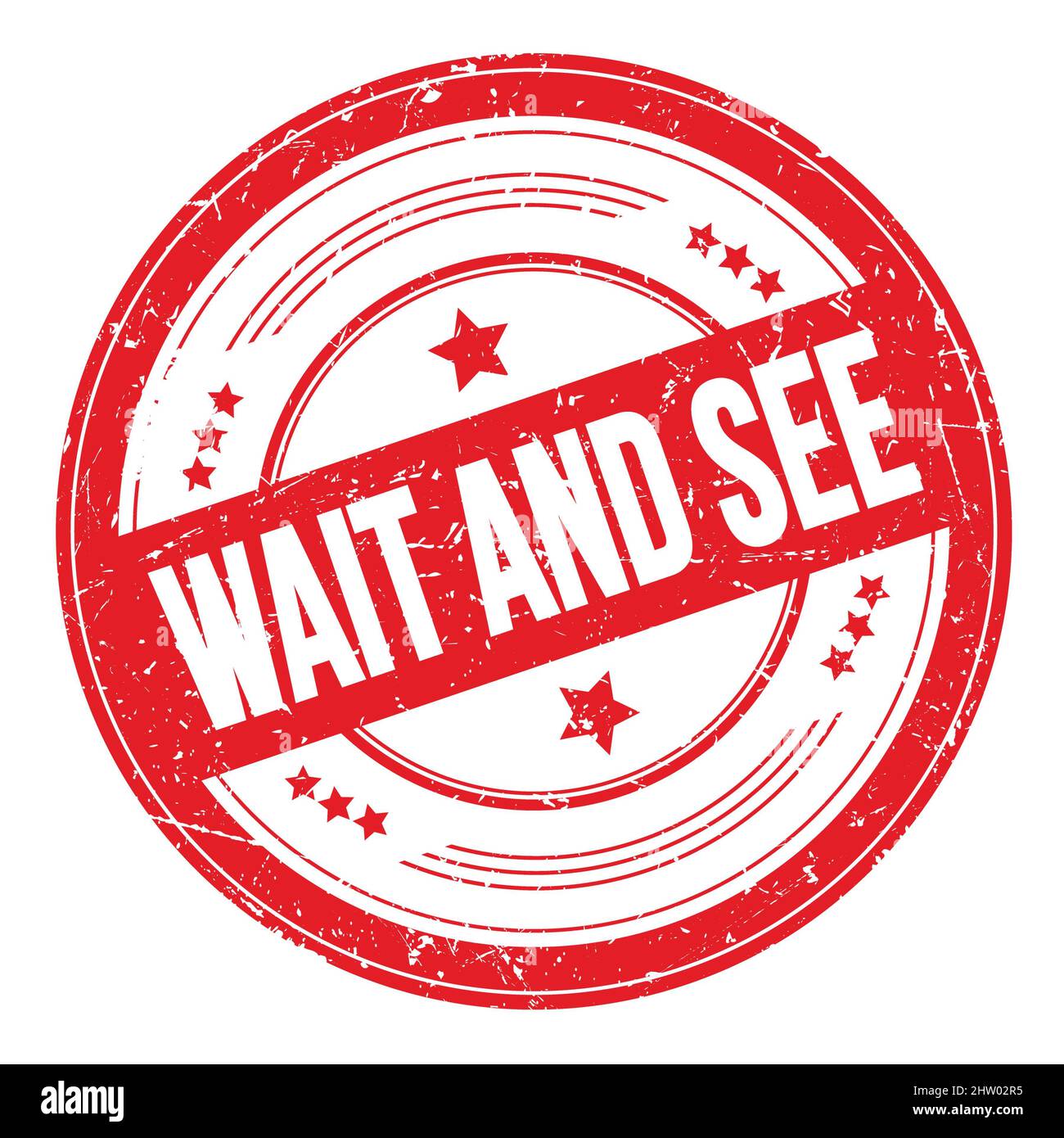 WAIT AND SEE text on red round grungy texture stamp Stock Photo - Alamy