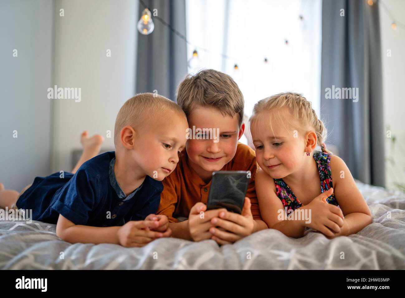 Childhood technology kids smartphone concept. Happy little children ...