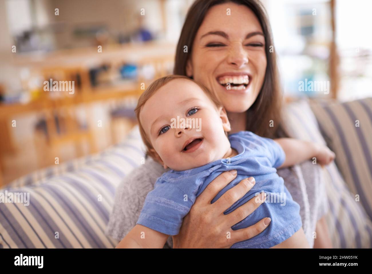 Mother looking after kids hi-res stock photography and images - Alamy
