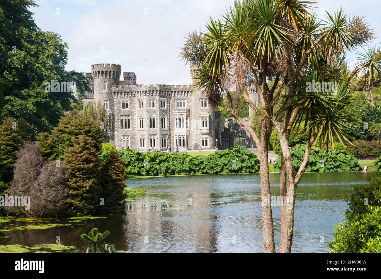 Johnstown Castle viewed across the ornamental lake. County Wexford ...