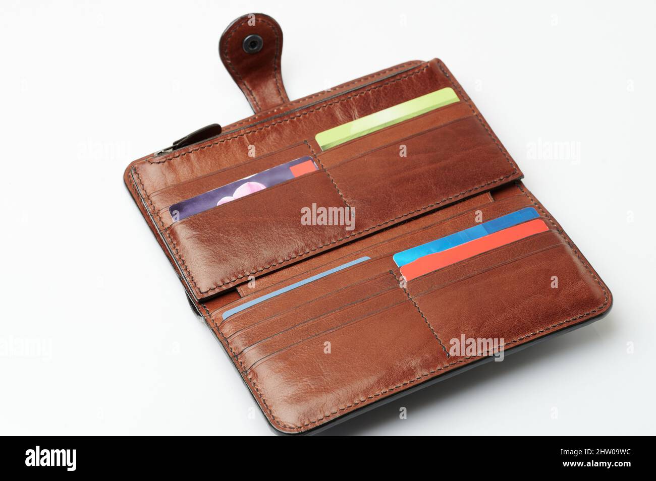 Open leather wallet with credit cards isolated on studio background ...
