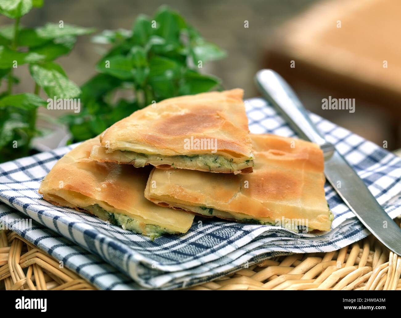 Pieces of a traditional greek pie ,made with homemade phyllo and ...