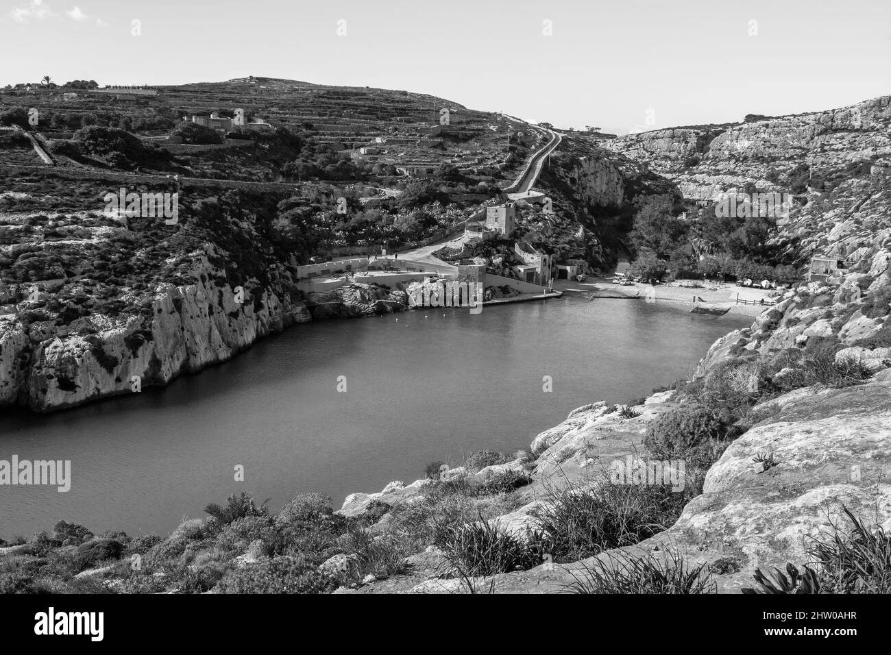 Black and white shot of bay at the drowned ria valley of Mgarr ix-Xini ...