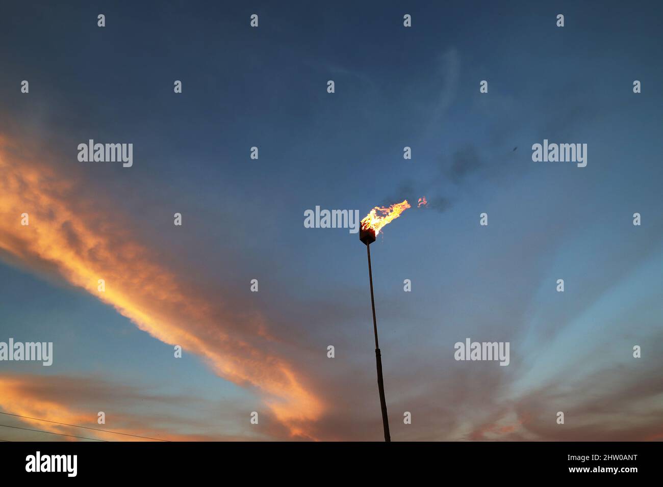 Fire torch sunset sky hi-res stock photography and images - Alamy