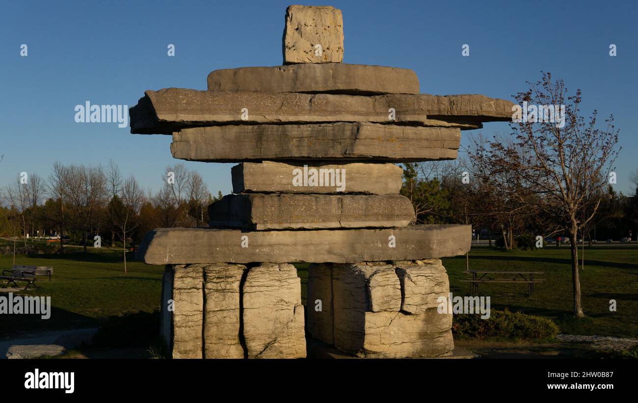 Inukshuk sculpture with large stacked and balanced rocks Stock Photo ...