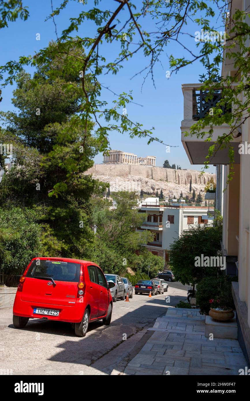 Athens, street scene with acropolis at background, Piraeus area ...