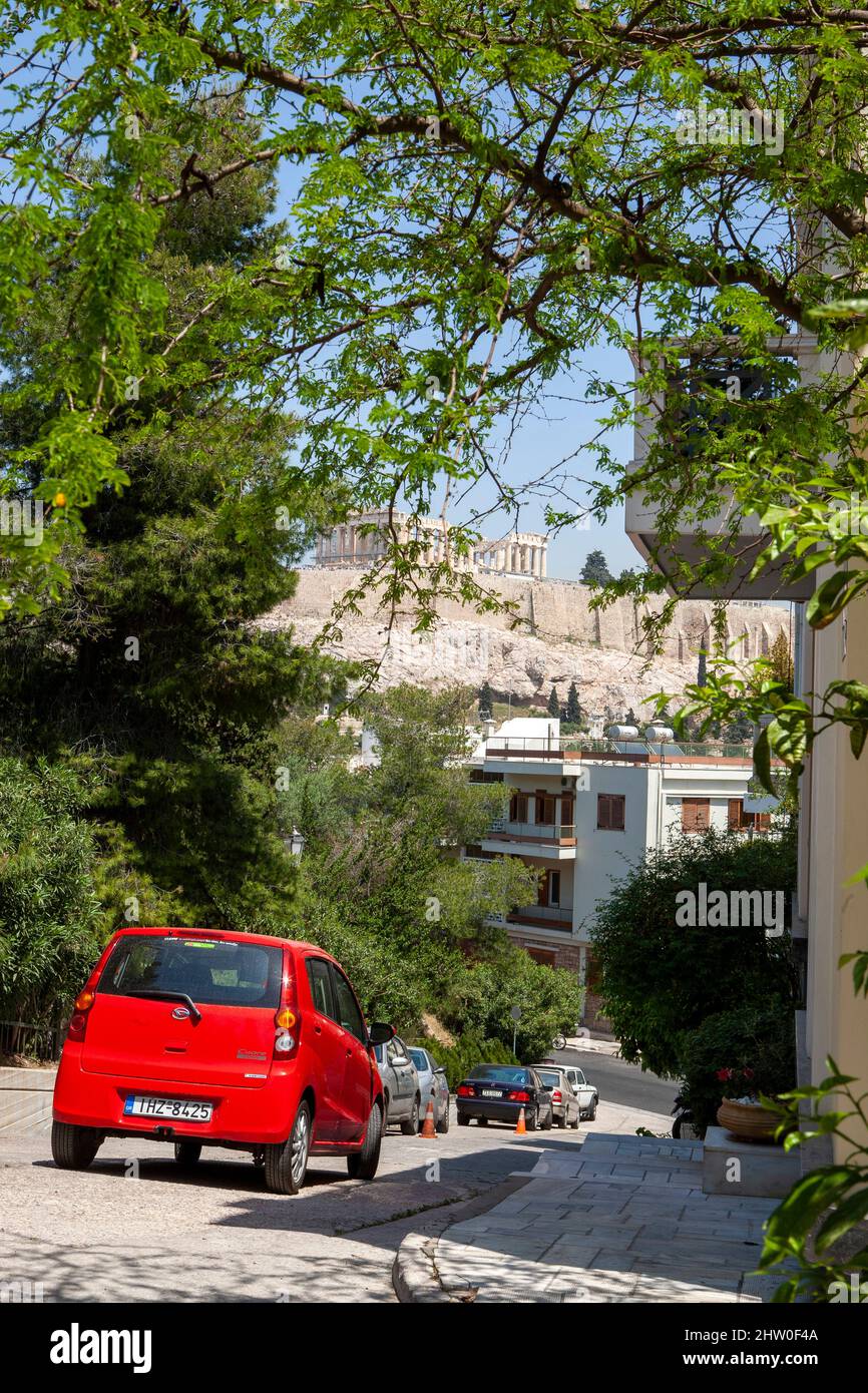 Athens, street scene with acropolis at background, Piraeus area ...