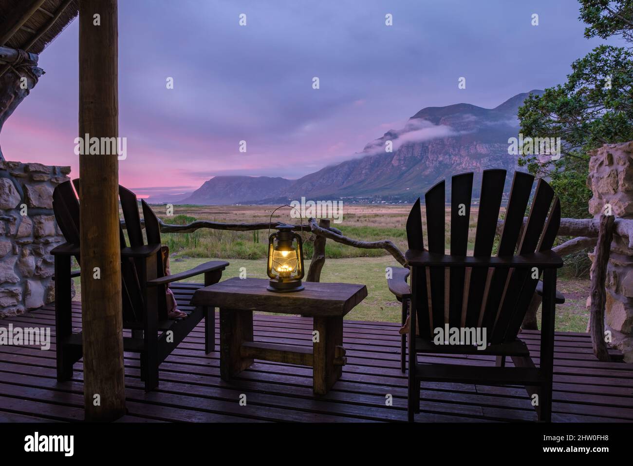 cabin lodge during sunset Mountains and grassland near Hermanus at the ...